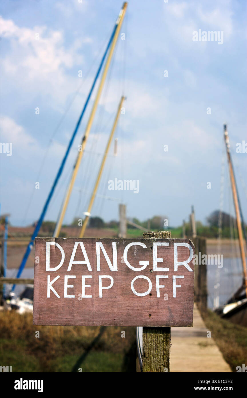 Danger keep out sign at the end of boat jetty Stock Photo - Alamy