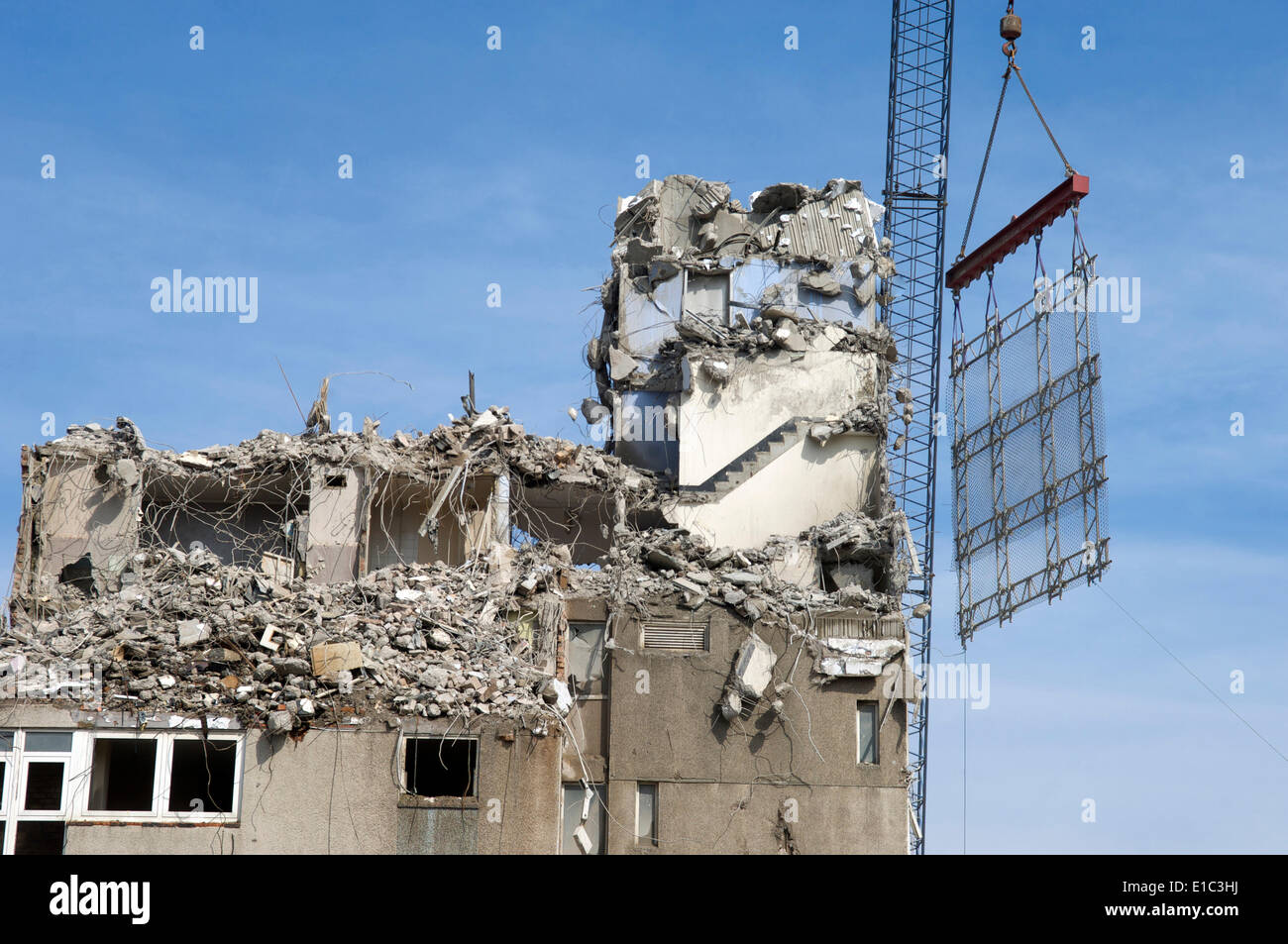 Work destroy regeneration redevelopmenthigh rise rubble safety barrier ...