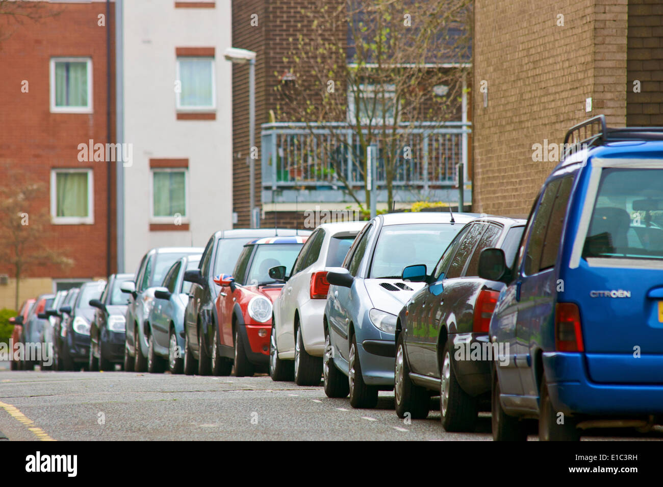 Cars parked on side street Stock Photo - Alamy