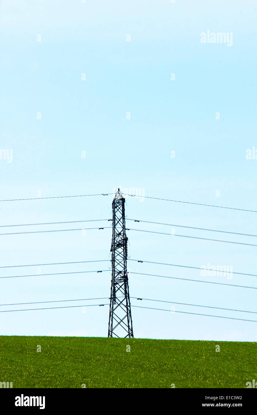 Overhead electricity pylons against the sky Stock Photo - Alamy