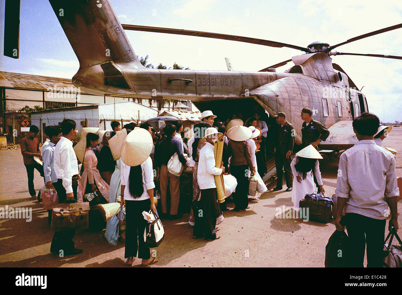 Vietnam War, South Vietnamese villagers board an Air Force CH-3C ...