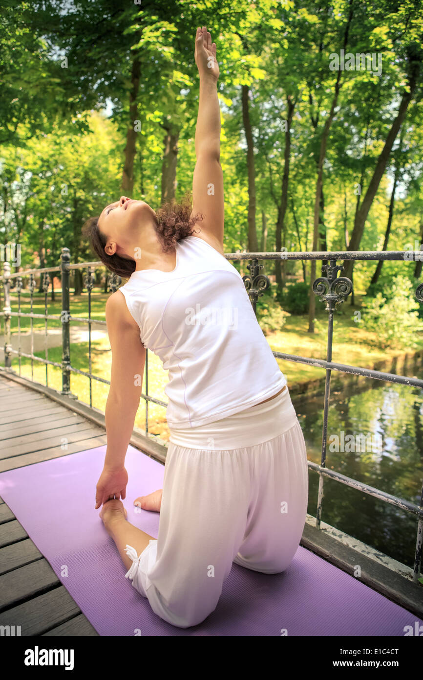Fitness woman water yoga hi-res stock photography and images - Alamy