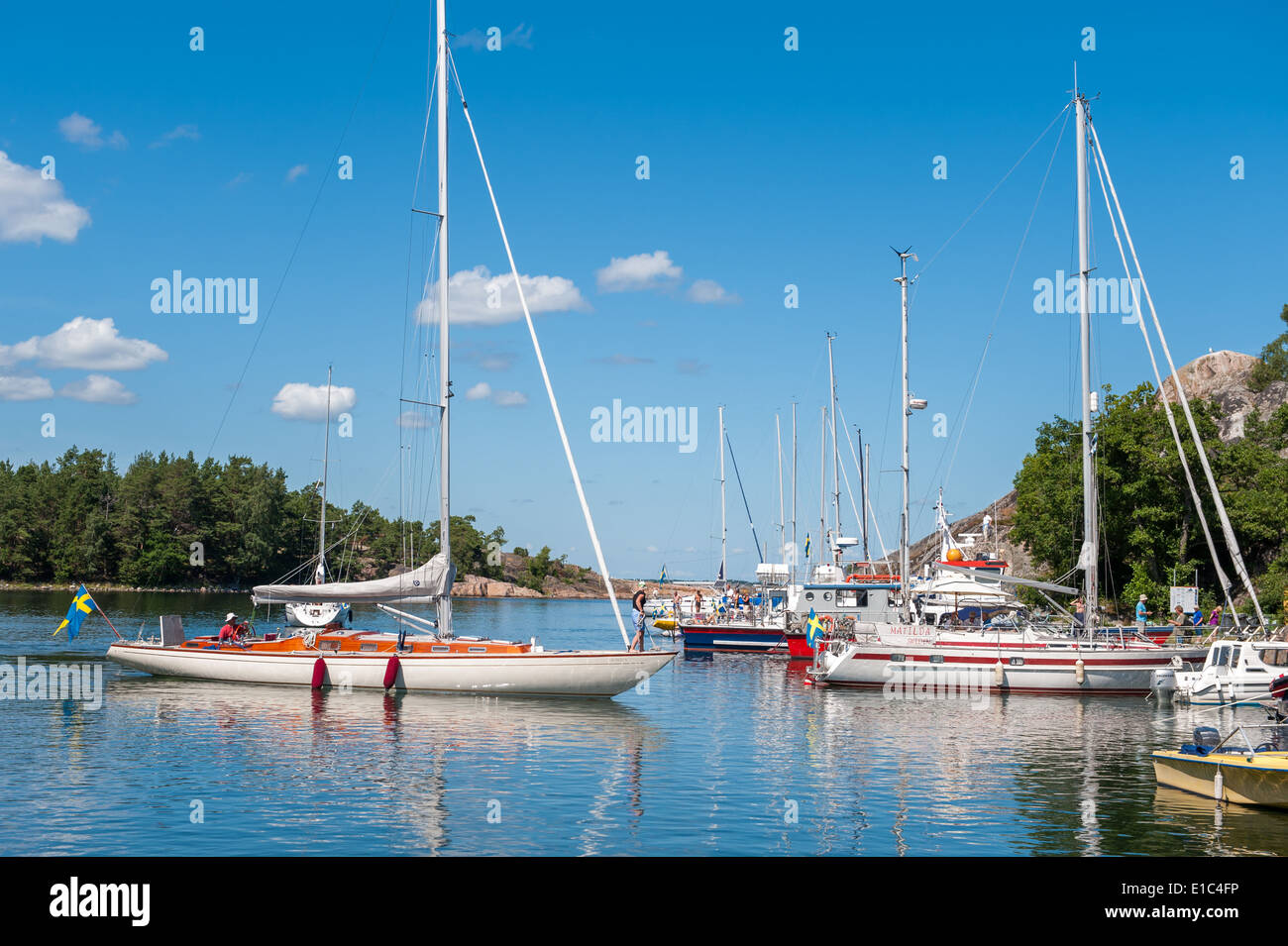 Summer in Sweden - sailing boat docks at Harstena Island in the Baltic ...