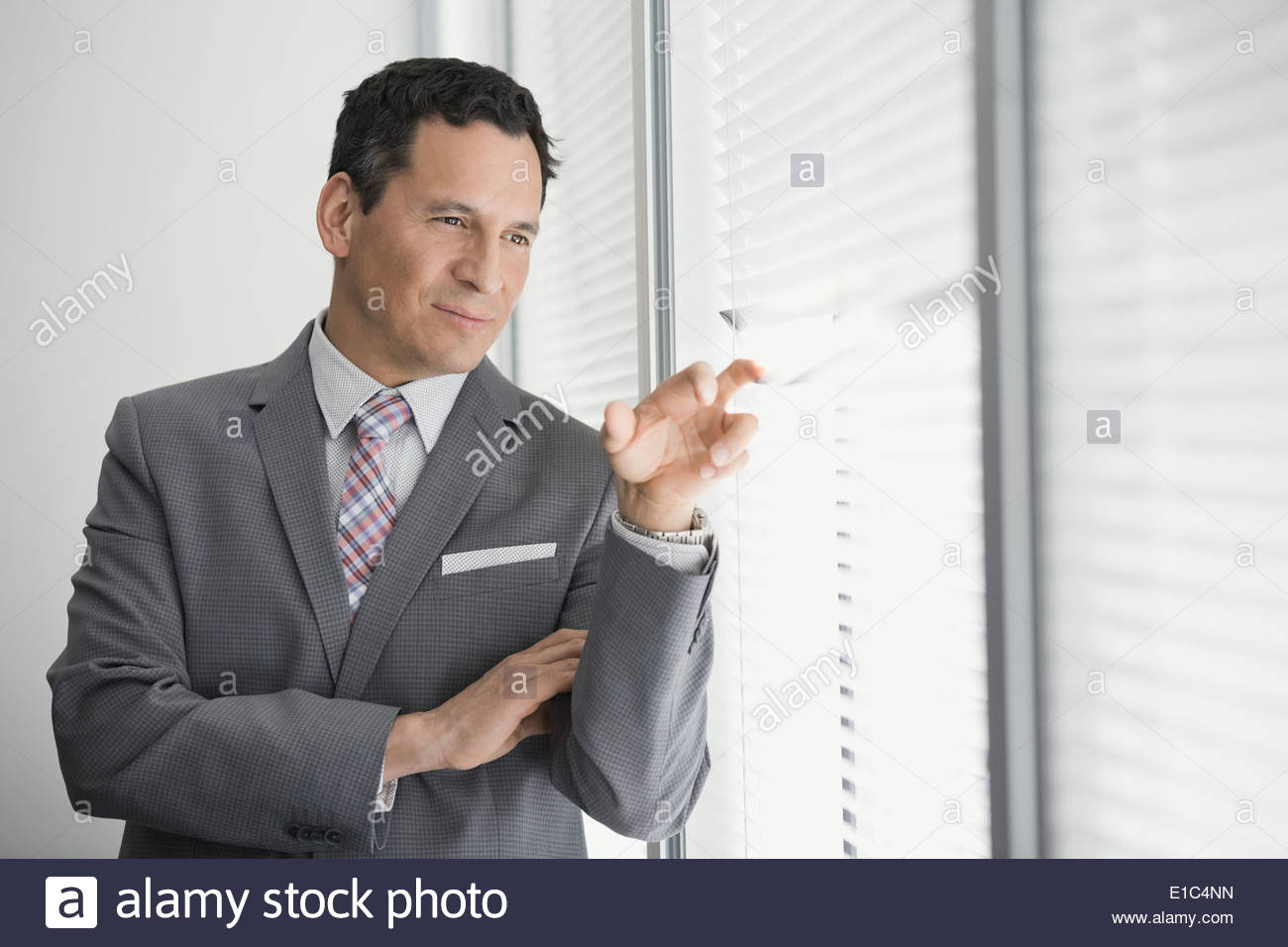 Man peering window hi-res stock photography and images - Alamy