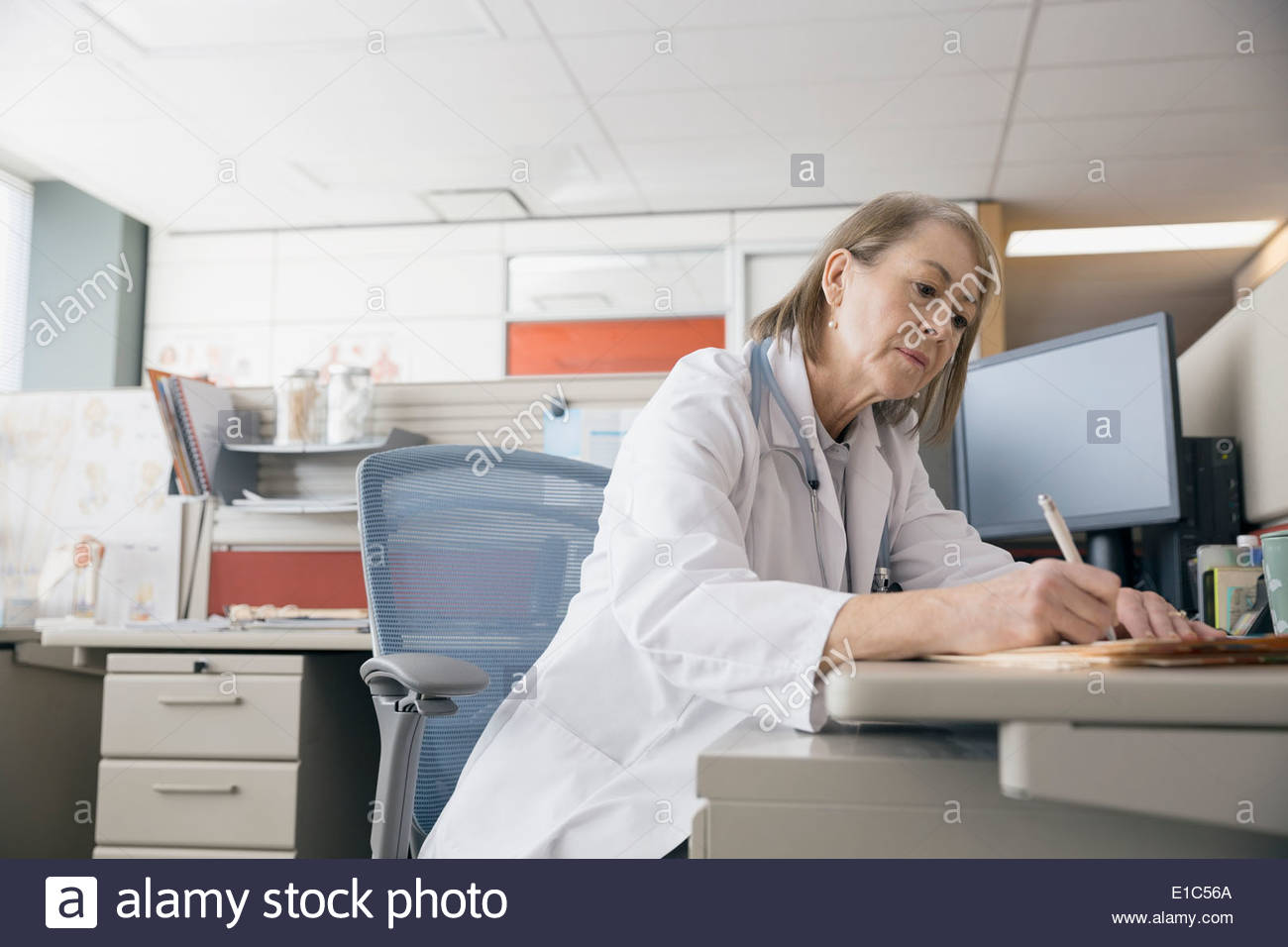 Doctor working desk hi-res stock photography and images - Alamy
