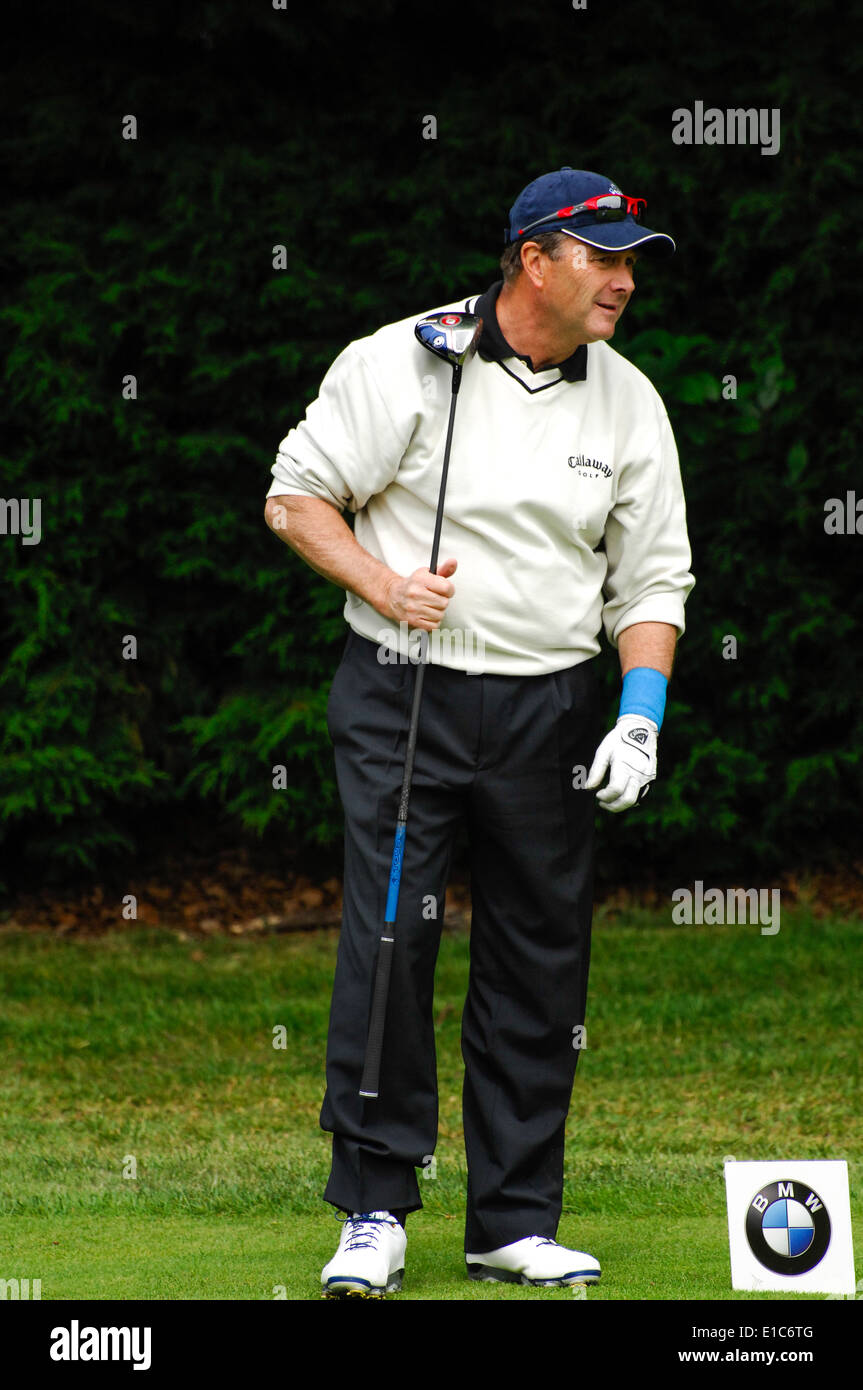 Nigel Mansell teeing off in the BMW championship at Wentworth golf club ...