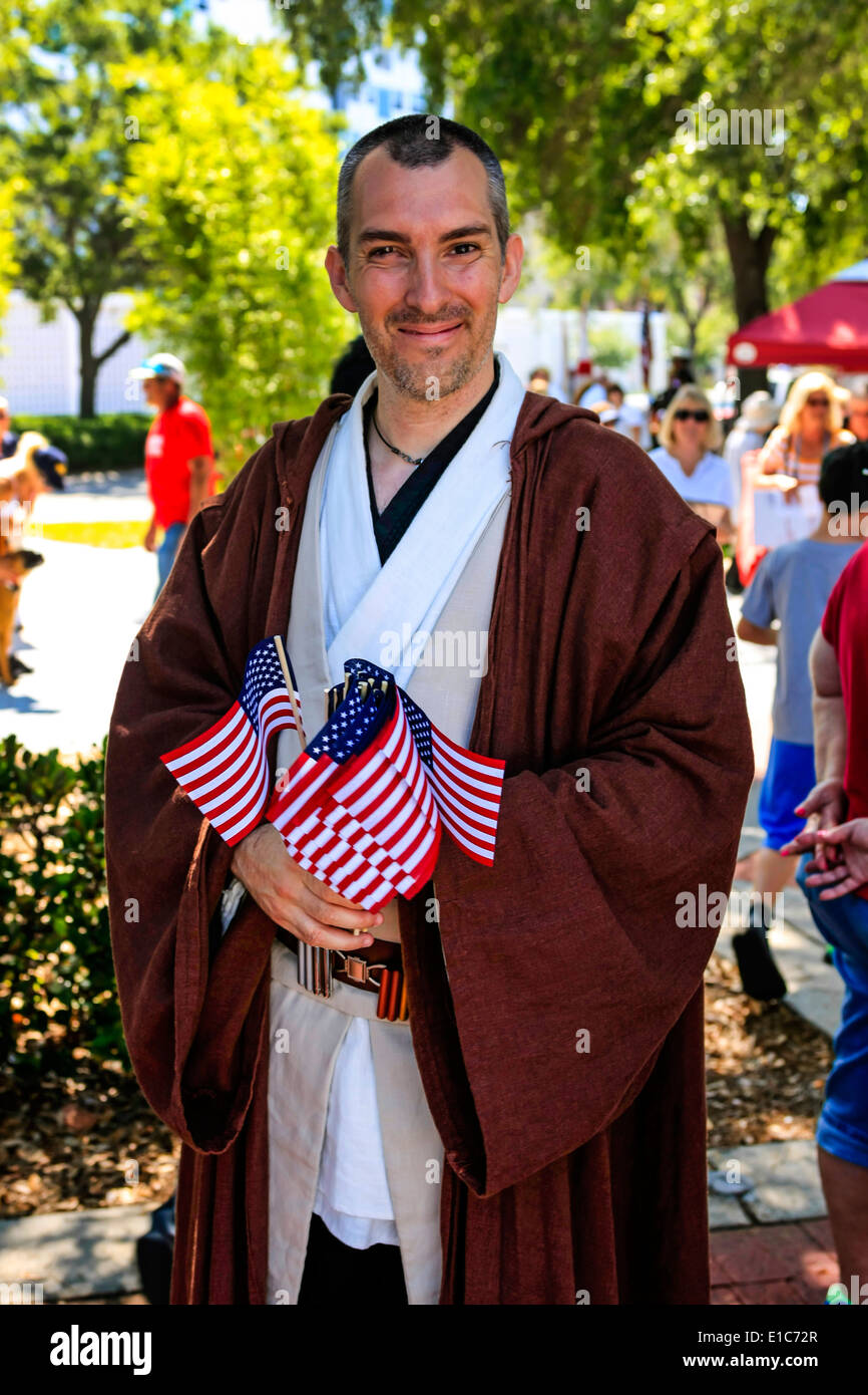 Star Wars Jedi Warrior handing out flags at an event in downtown ...