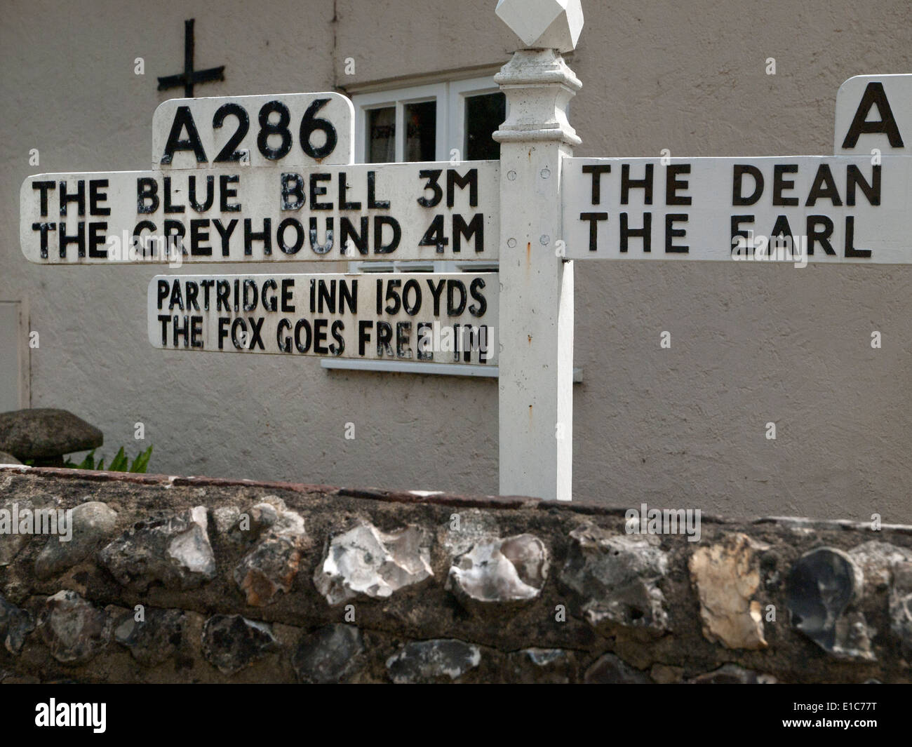 Conflicting road signs at a junction in southern England Stock Photo ...
