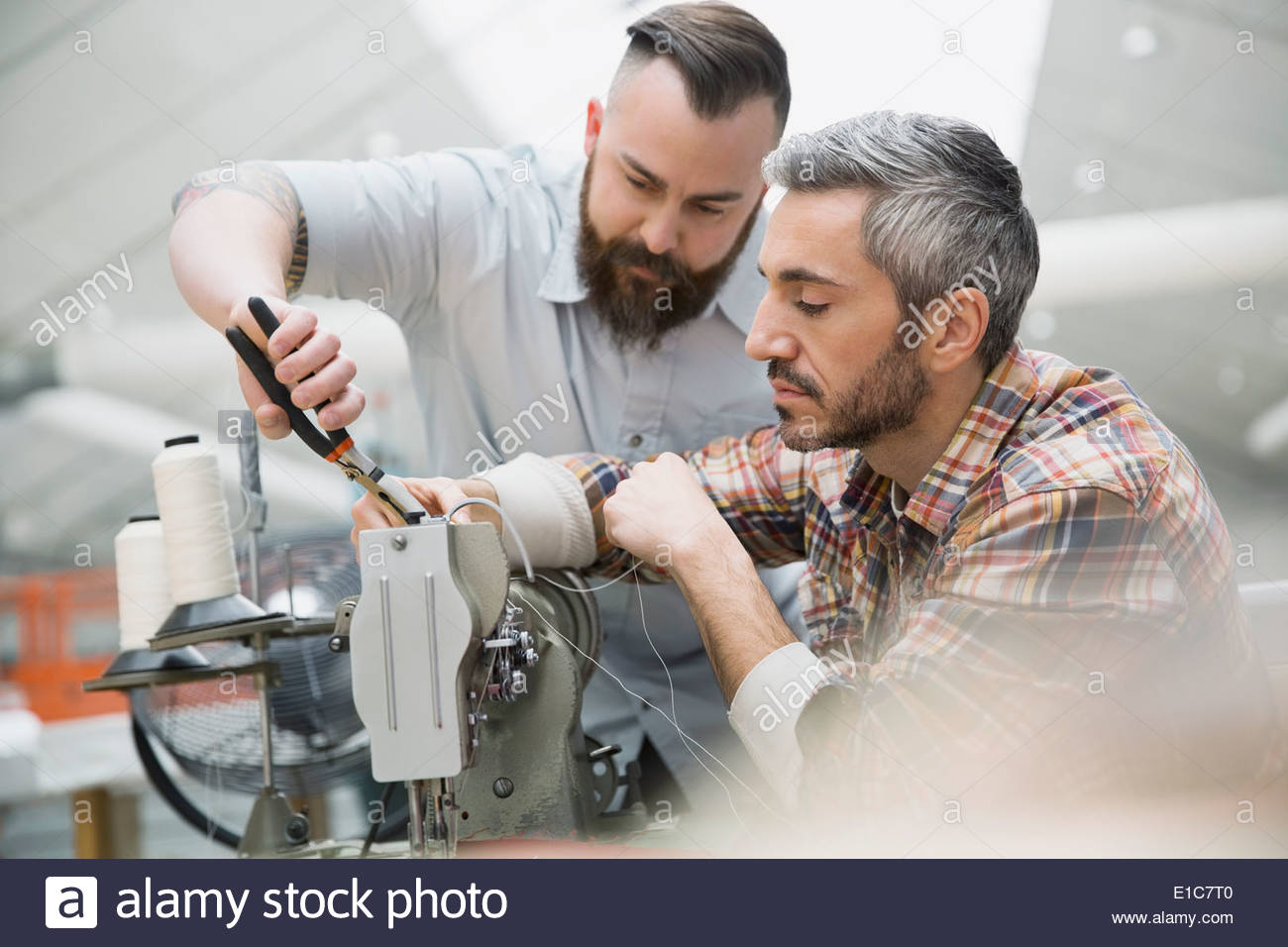 Workers sewing hi-res stock photography and images - Alamy