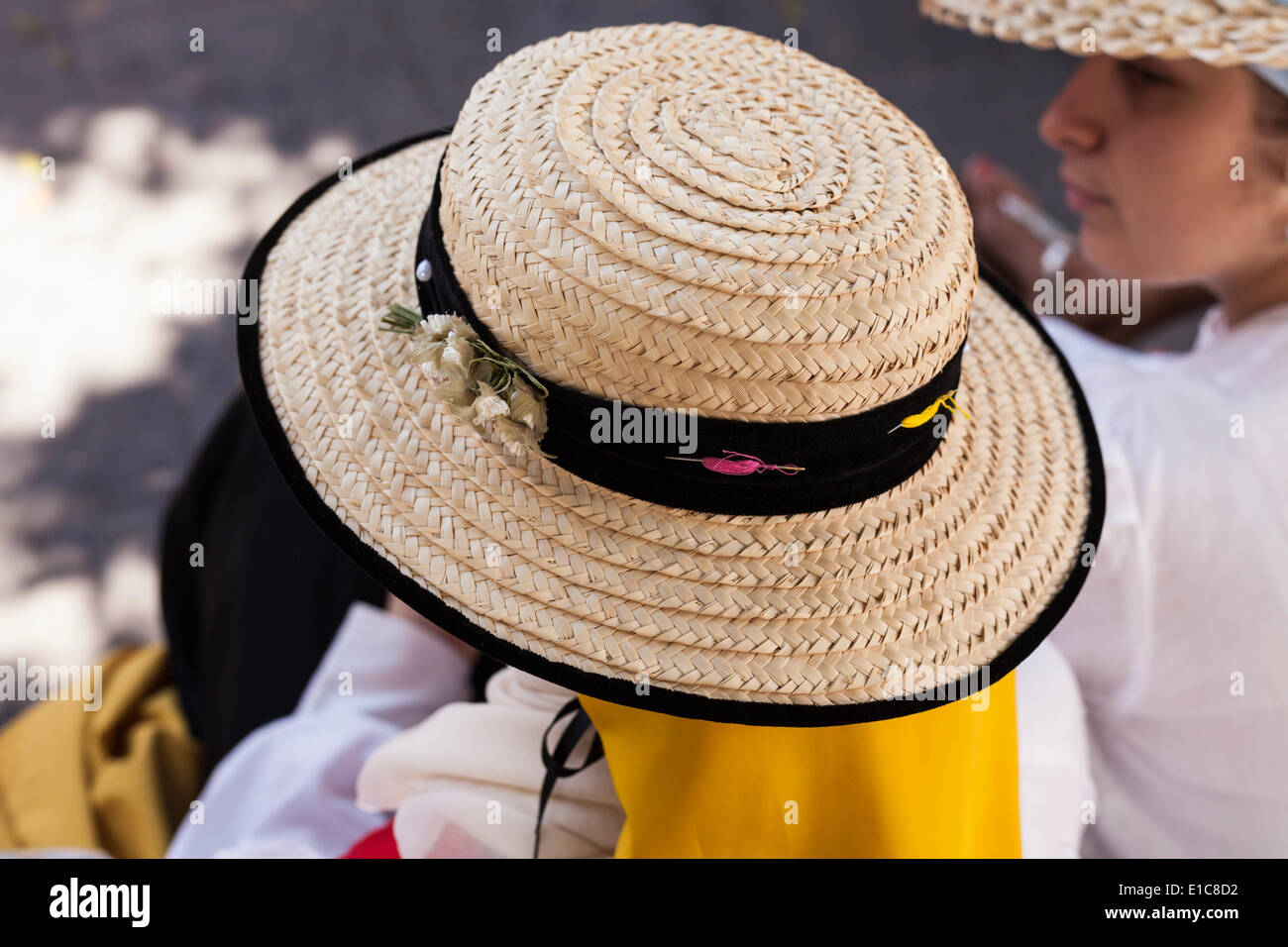 Straw hat decorated with needles and thread at the celebrations for ...