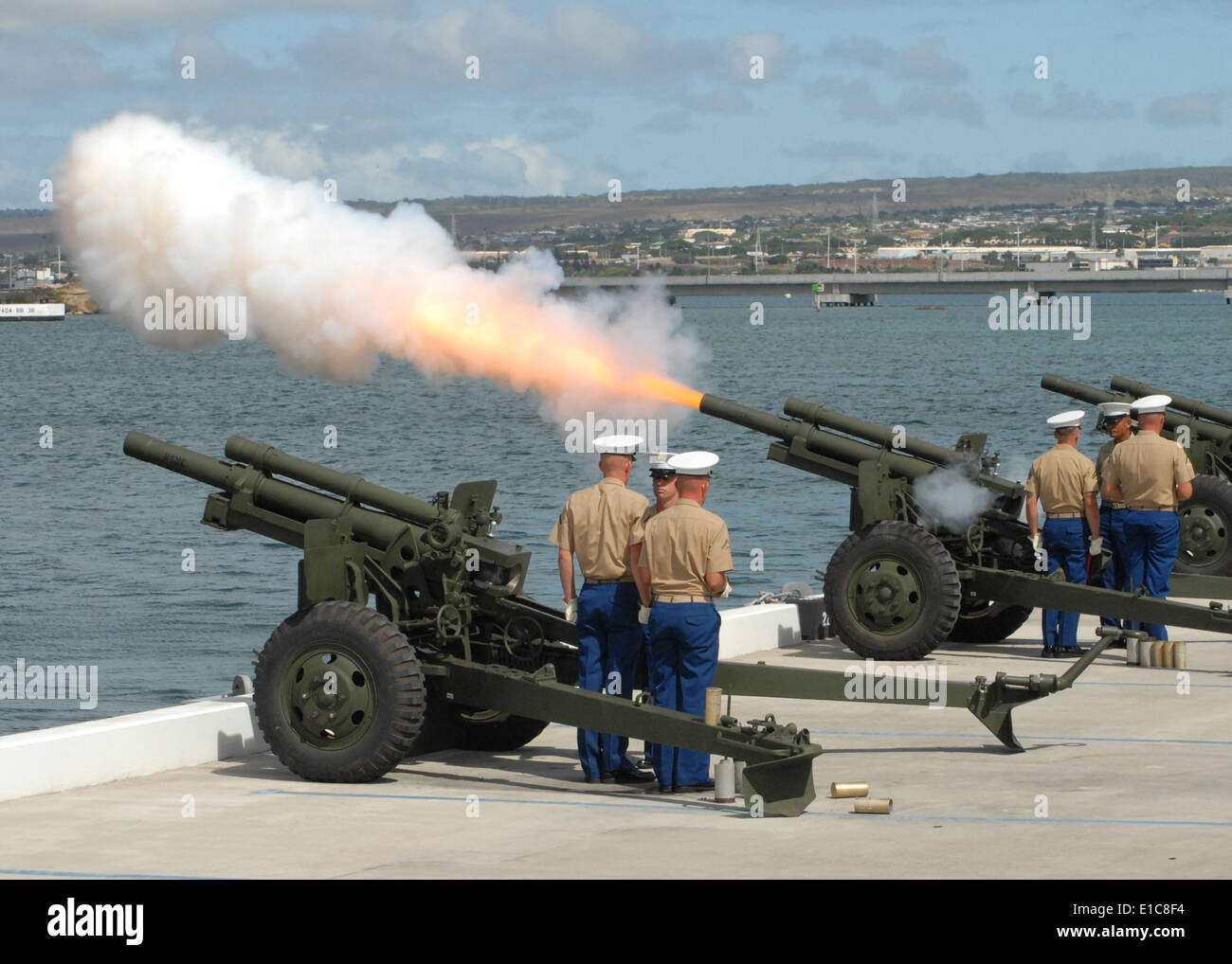 U.S. Marines from a saluting battery detail fire a 17-gun salute for ...