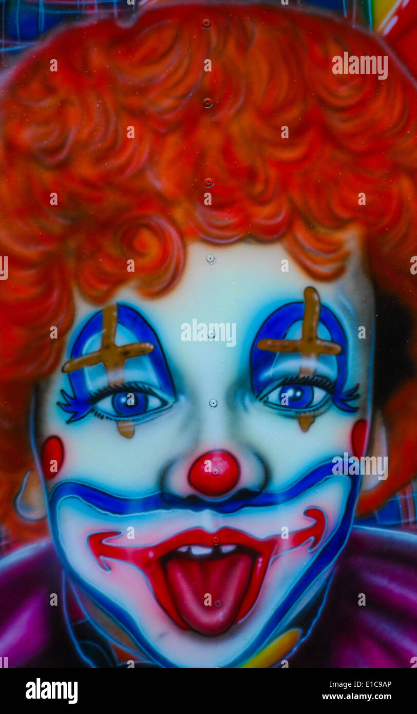 Clown face at the funfair Stock Photo - Alamy