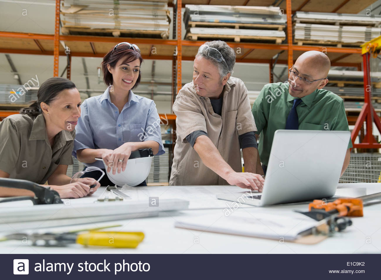 Manufacturing technology workers hi-res stock photography and images ...