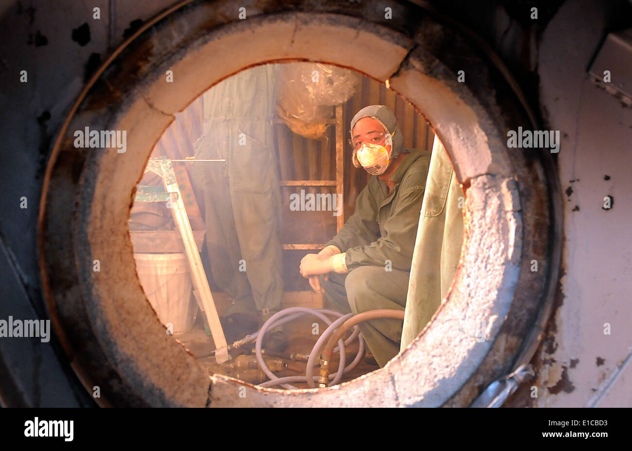 A member of the U.S. Naval Ship Repair Facility and Japan Regional ...