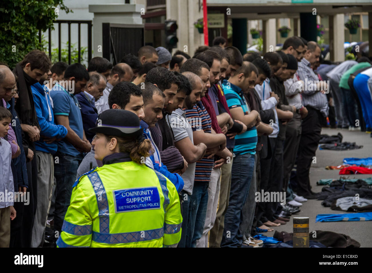 London, UK. 30th May 2014. Muslims attend Friday prayers at the London ...