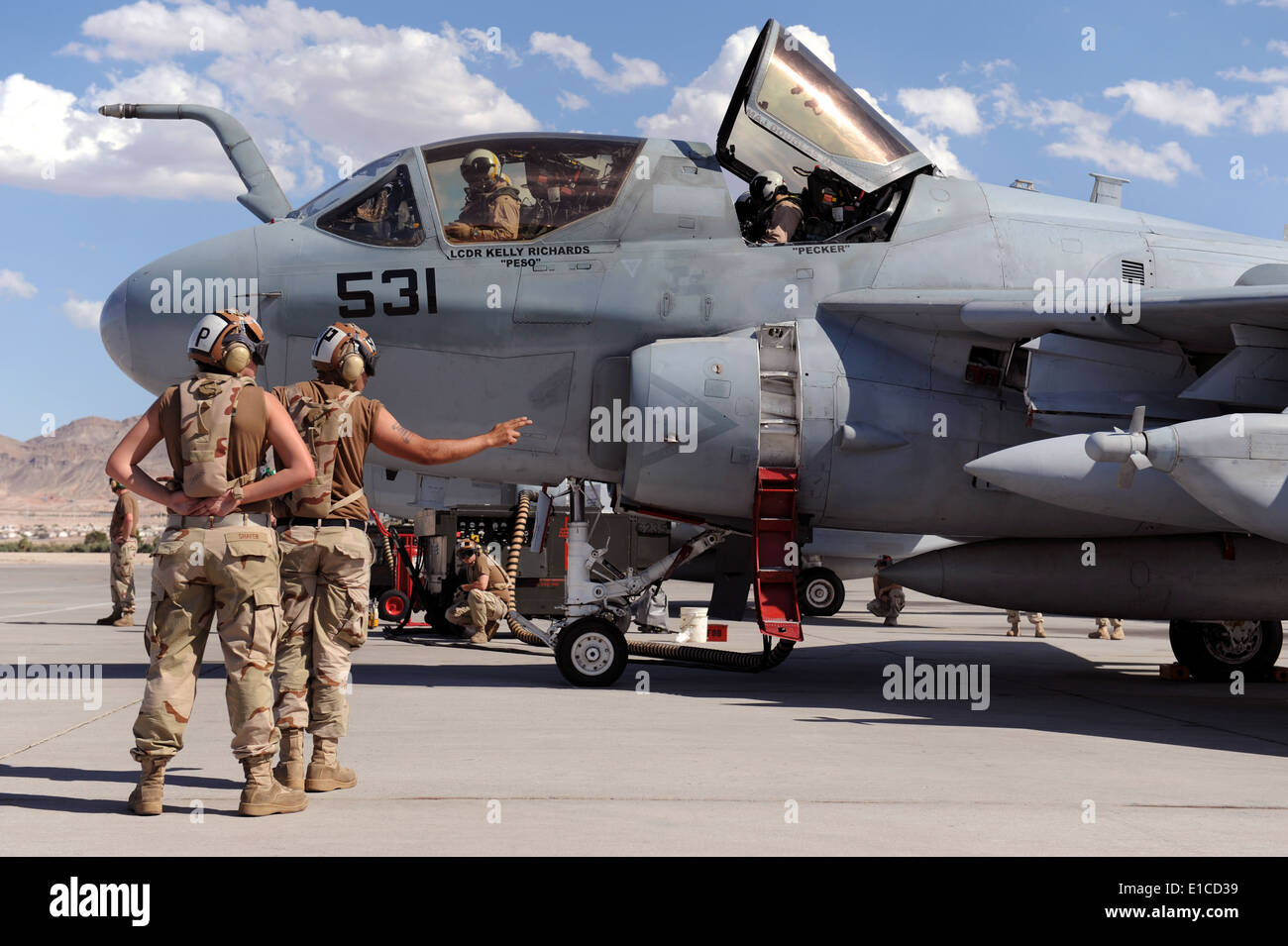 U.S. Navy Airman Fabian Lopez, a flight captain from Electronic Attack ...