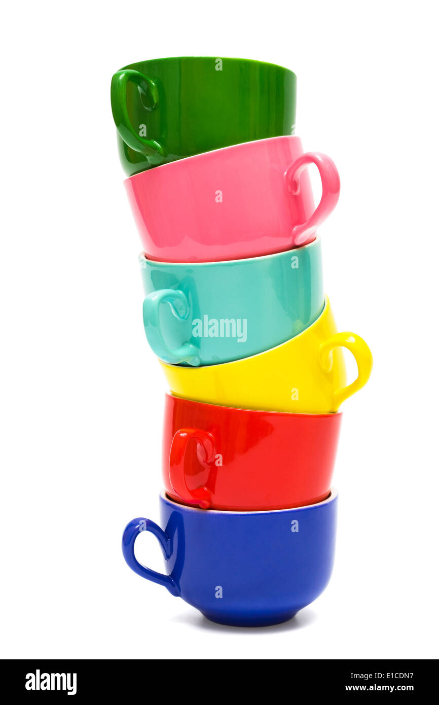 Beautiful color cups on a white background Stock Photo - Alamy