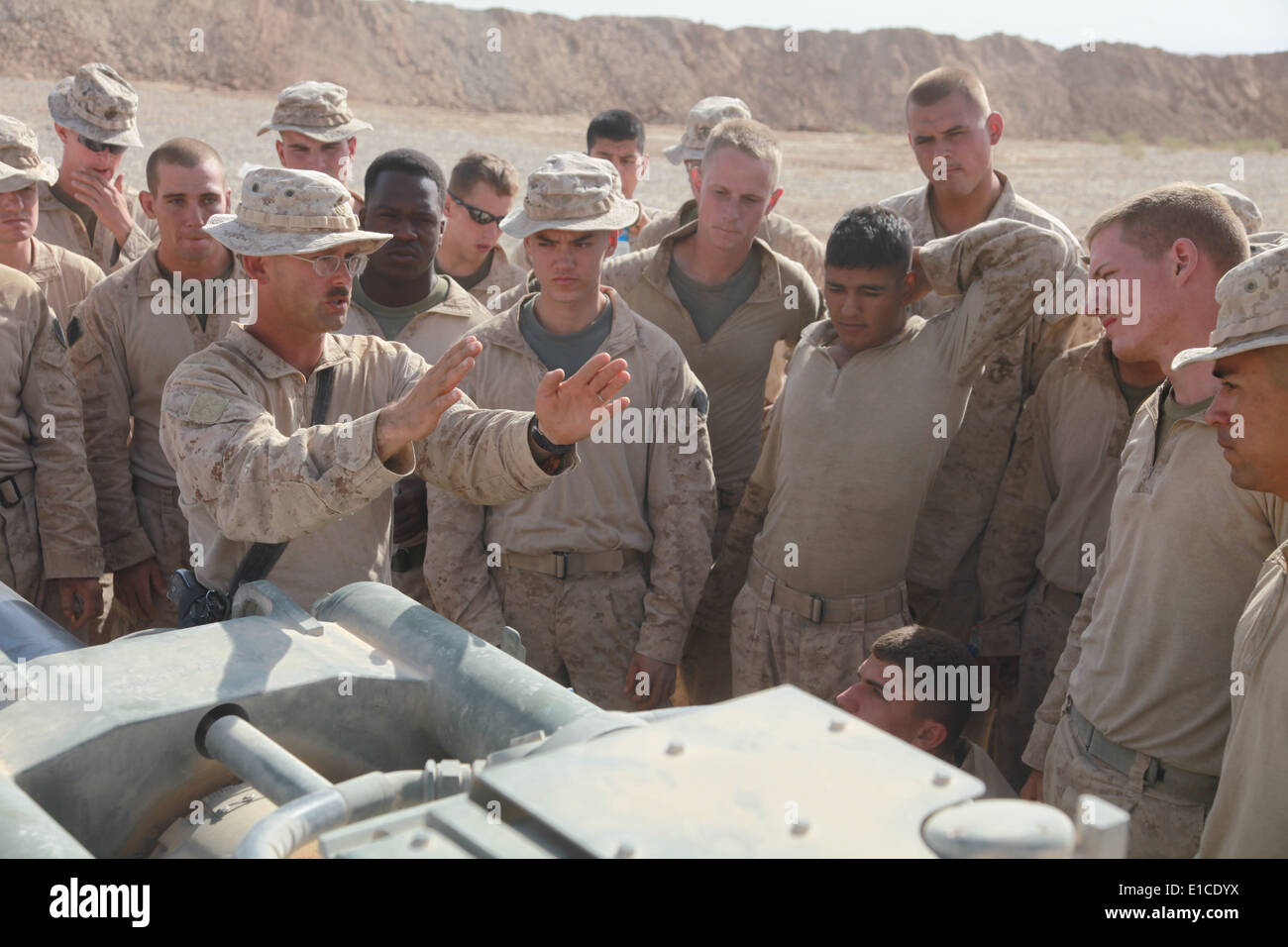 U.S. Marine Corps Staff Sgt. Stephen Lapek teaches a class for fellow ...