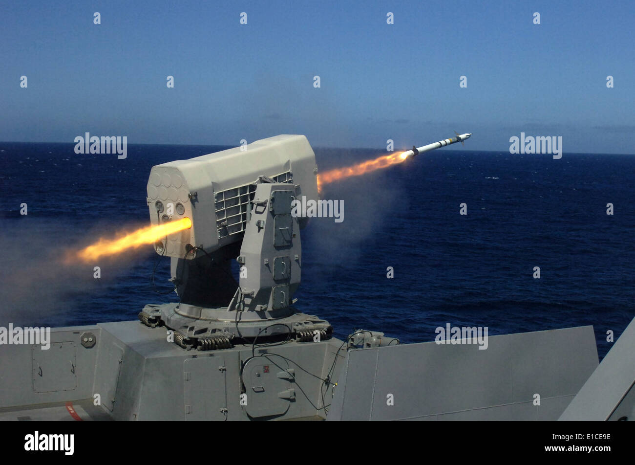 A surface-to-air intercept missile fires from a Rolling Airframe ...