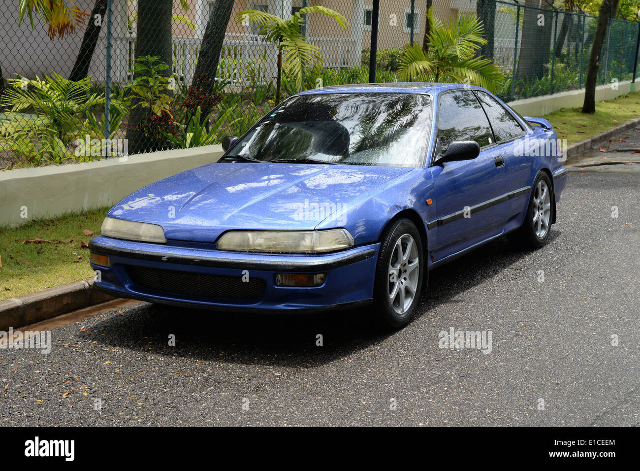 Blue Car in the Caribbean Stock Photo - Alamy