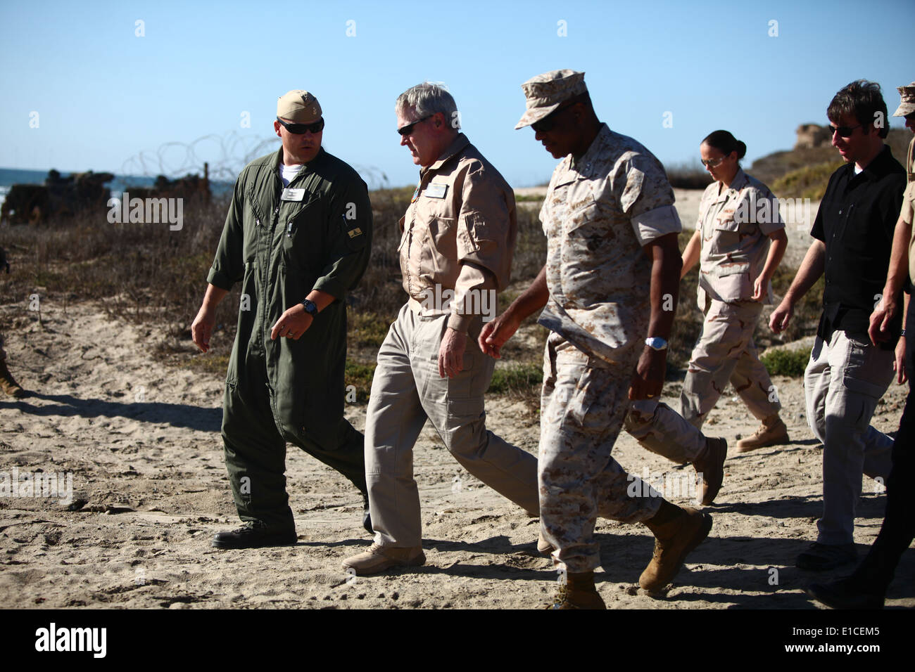 Secretary of the Navy Ray Mabus, center, and the crew of Landing Craft ...