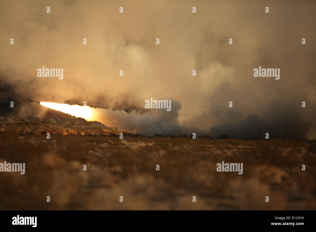 An M28A1 training round launches from an XM-142 High Mobility Artillery ...