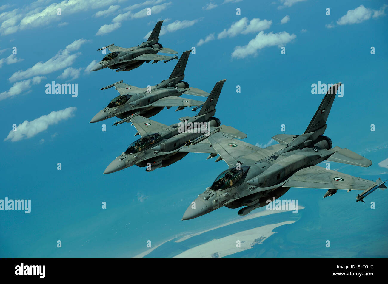 Emirati F-16 Fighting Falcon aircraft fly in formation over Southwest ...