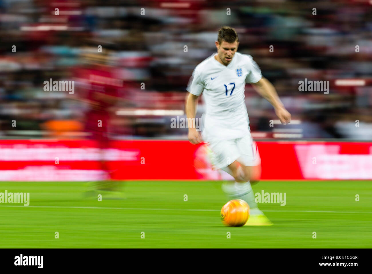 Wembley, UK. 30th May, 2014. Pab blur of England's James MILNER in ...