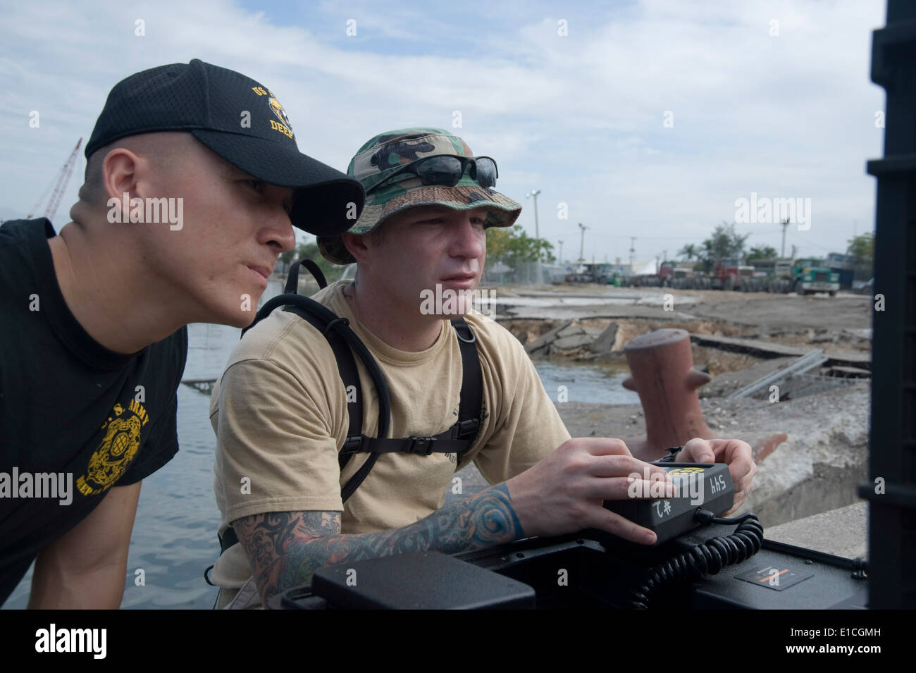 U.S. Army Capt. Scott Sann, left, commander of the 544th Engineer Dive ...