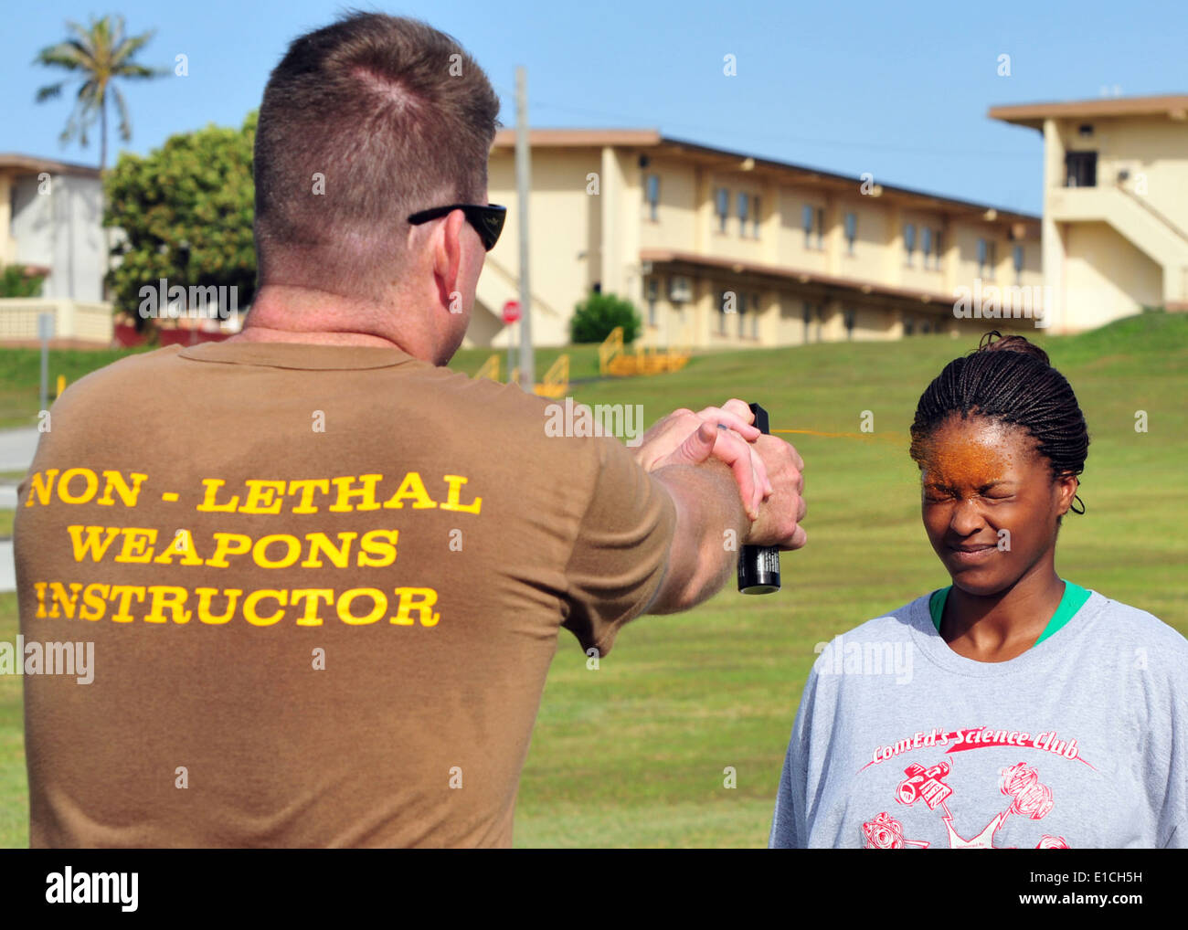 U.S. Navy Chief Gunner's Mate Chad Magwire, left, assigned to the ...