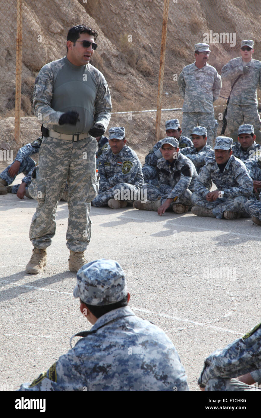 Interpreter Larry Lawrence translates information from U.S. Army Sgt ...