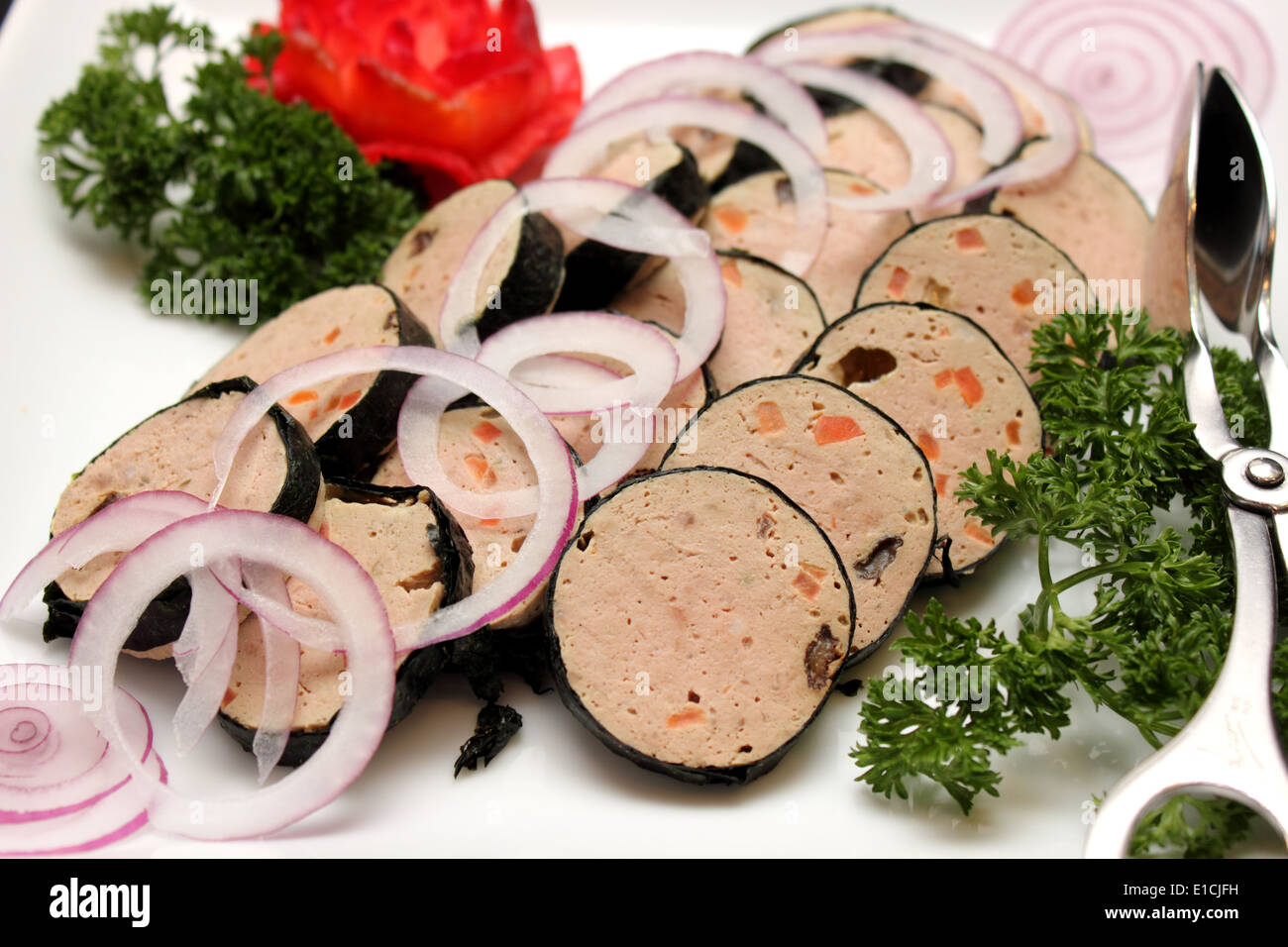 Duck liver terrine wrapped in seaweed with onions slides Stock Photo ...