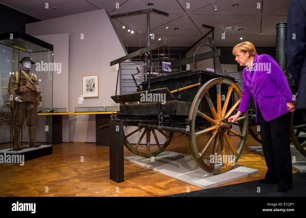 German Chancellor Angela Merkel looks at a horse drawn field kitchen at ...