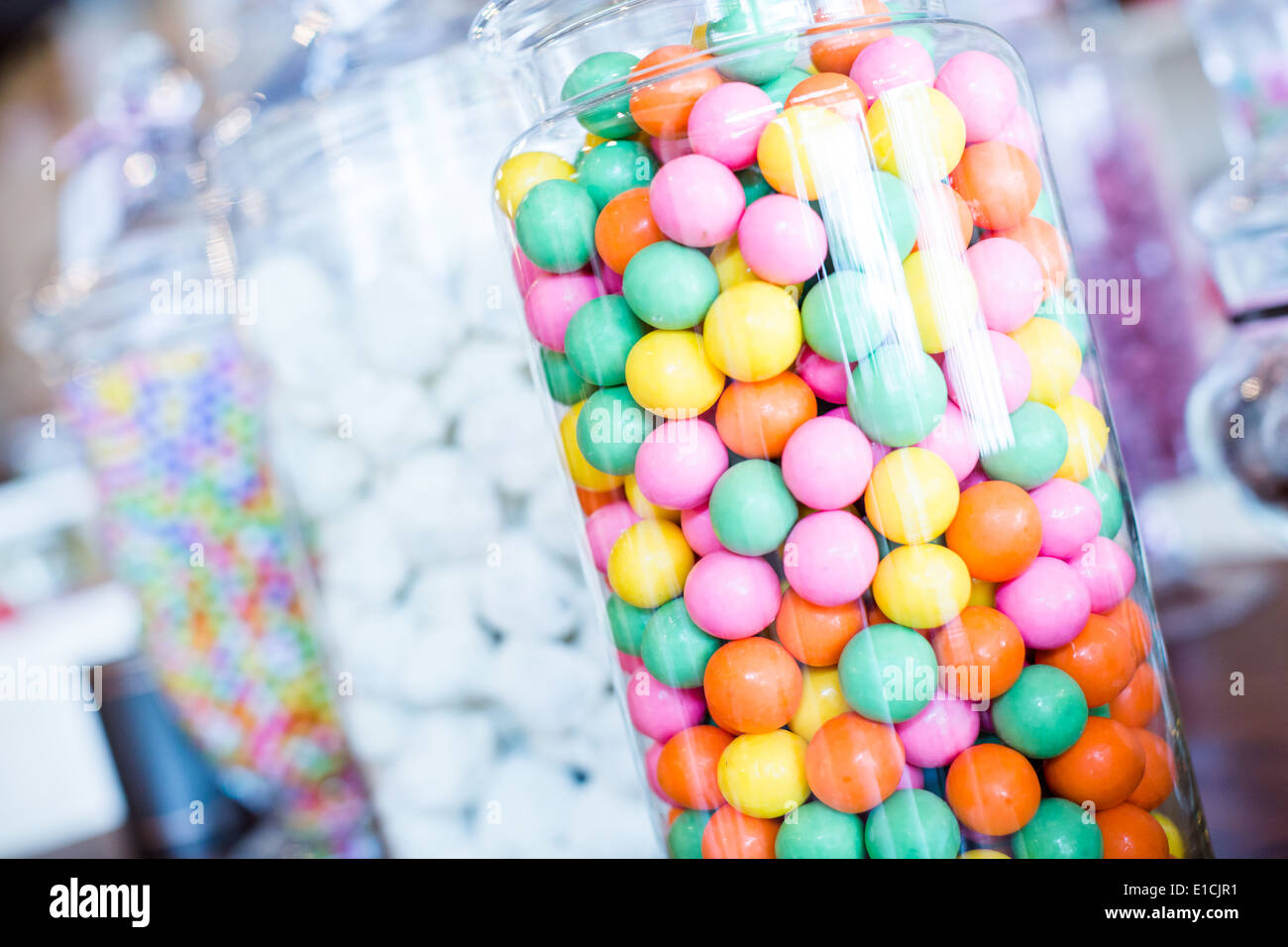 Multicolored candies on display at the candy store Stock Photo - Alamy