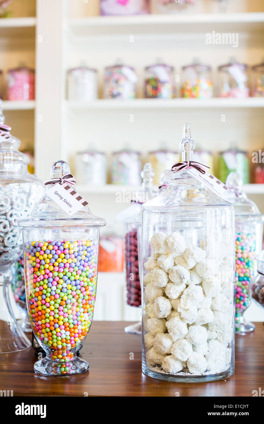 Multicolored candies on display at the candy store Stock Photo - Alamy