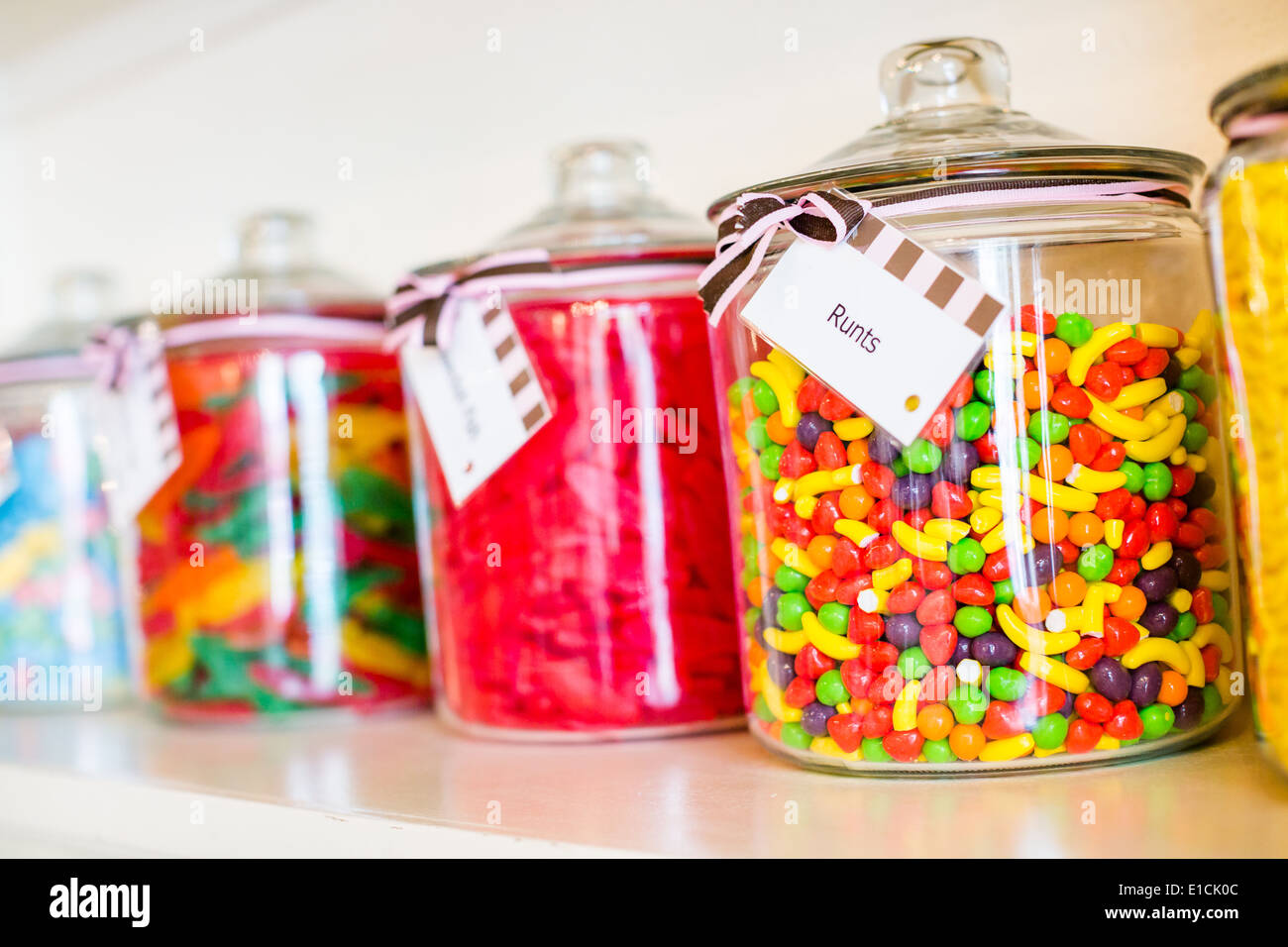Multicolored candies on display at the candy store Stock Photo - Alamy