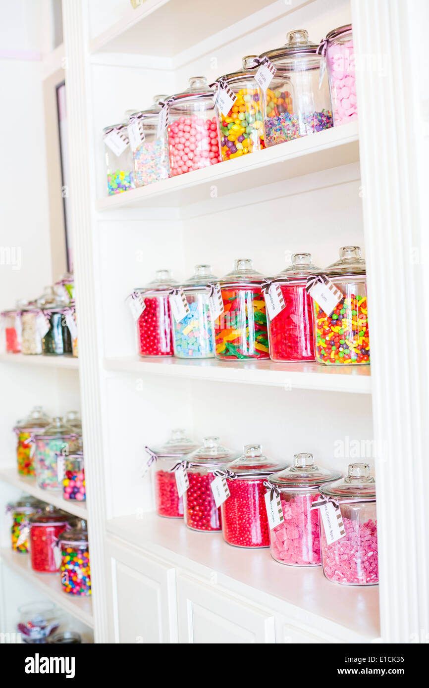 Multicolored candies on display at the candy store Stock Photo - Alamy