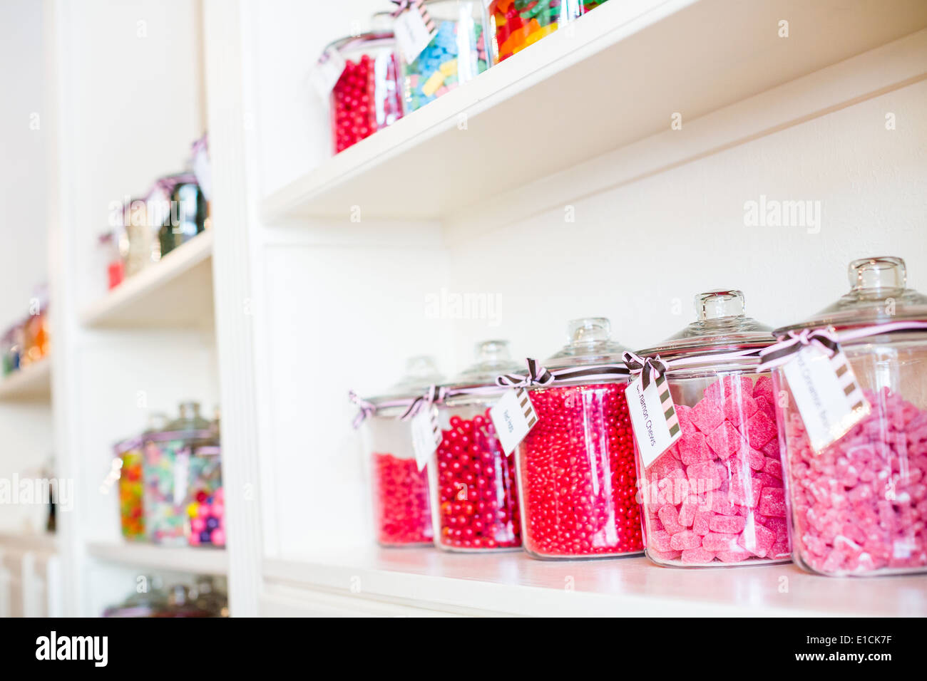 Multicolored candies on display at the candy store Stock Photo - Alamy