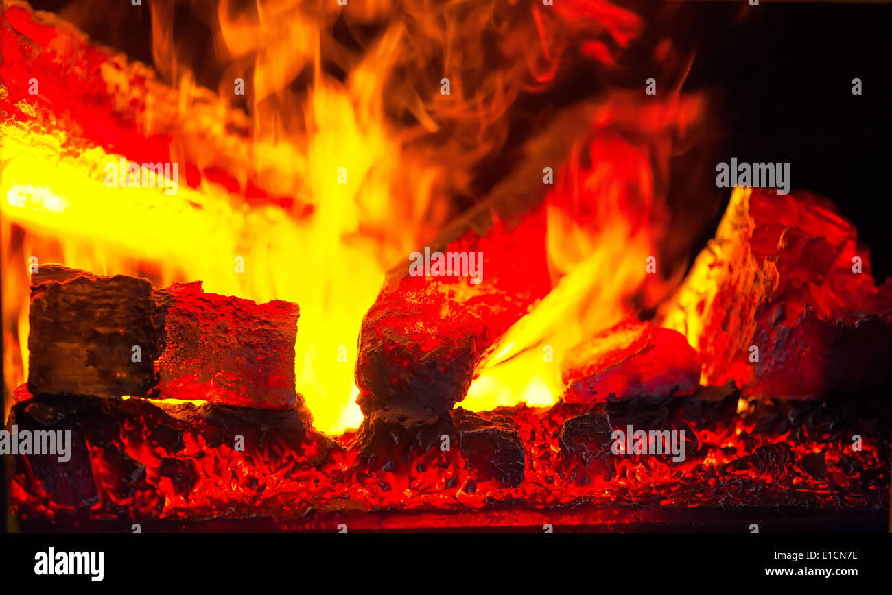 red-hot coals in the fire macro Stock Photo - Alamy