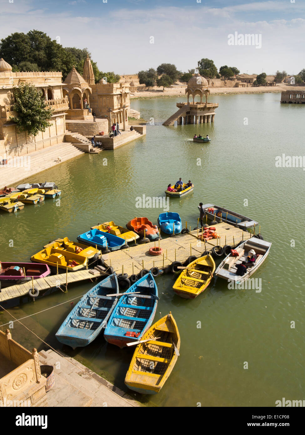 India, Rajasthan, Jaisalmer, Gadi Sagar, paddling and rowing boats for ...