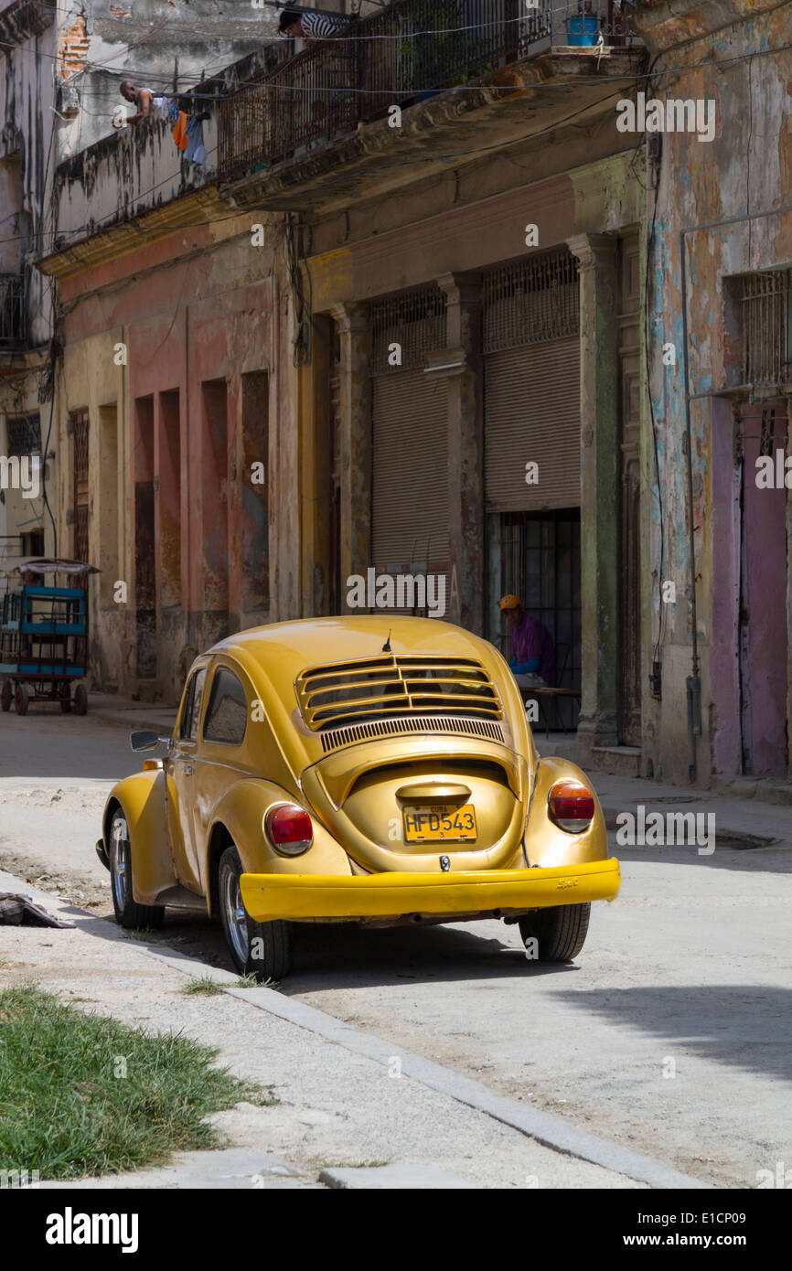 Gold colored VW Beetle parked in downtown Havana Stock Photo - Alamy