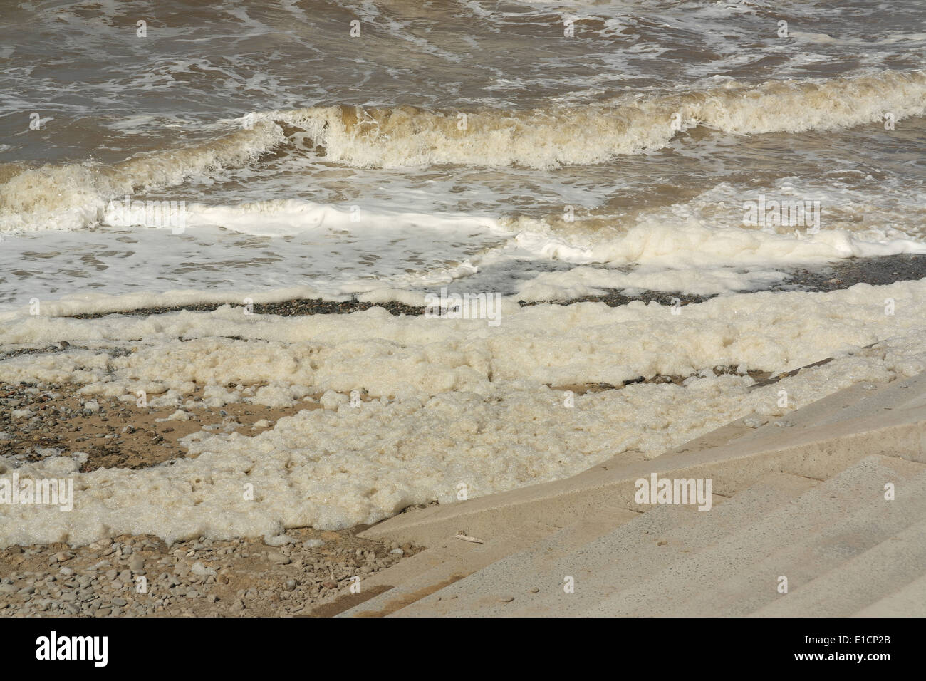 Concrete steps descending shingle beach right mid distance hi-res stock ...