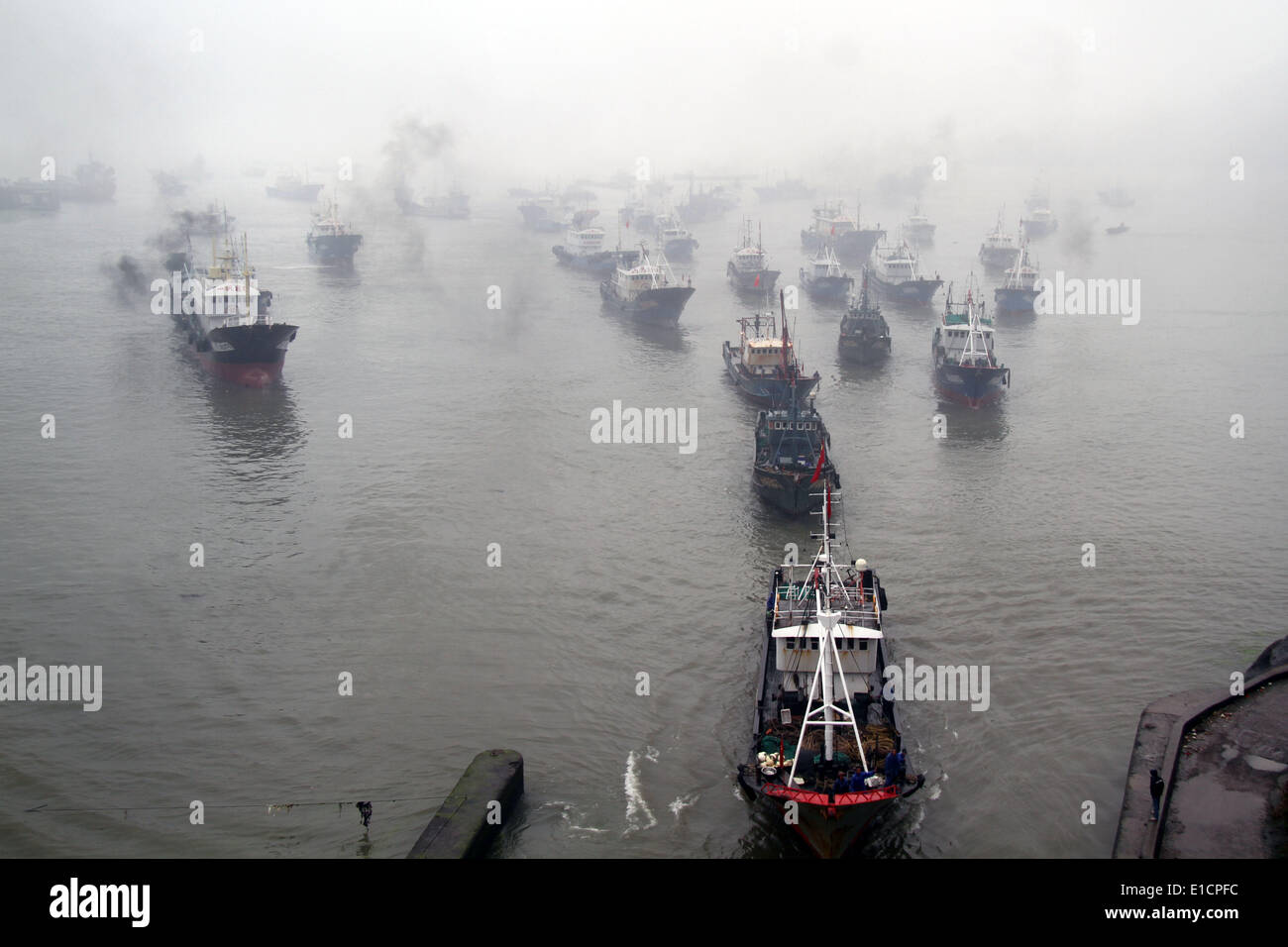 Taizhou, China's Zhejiang Province. 31st May, 2014. Fishing boats sail ...