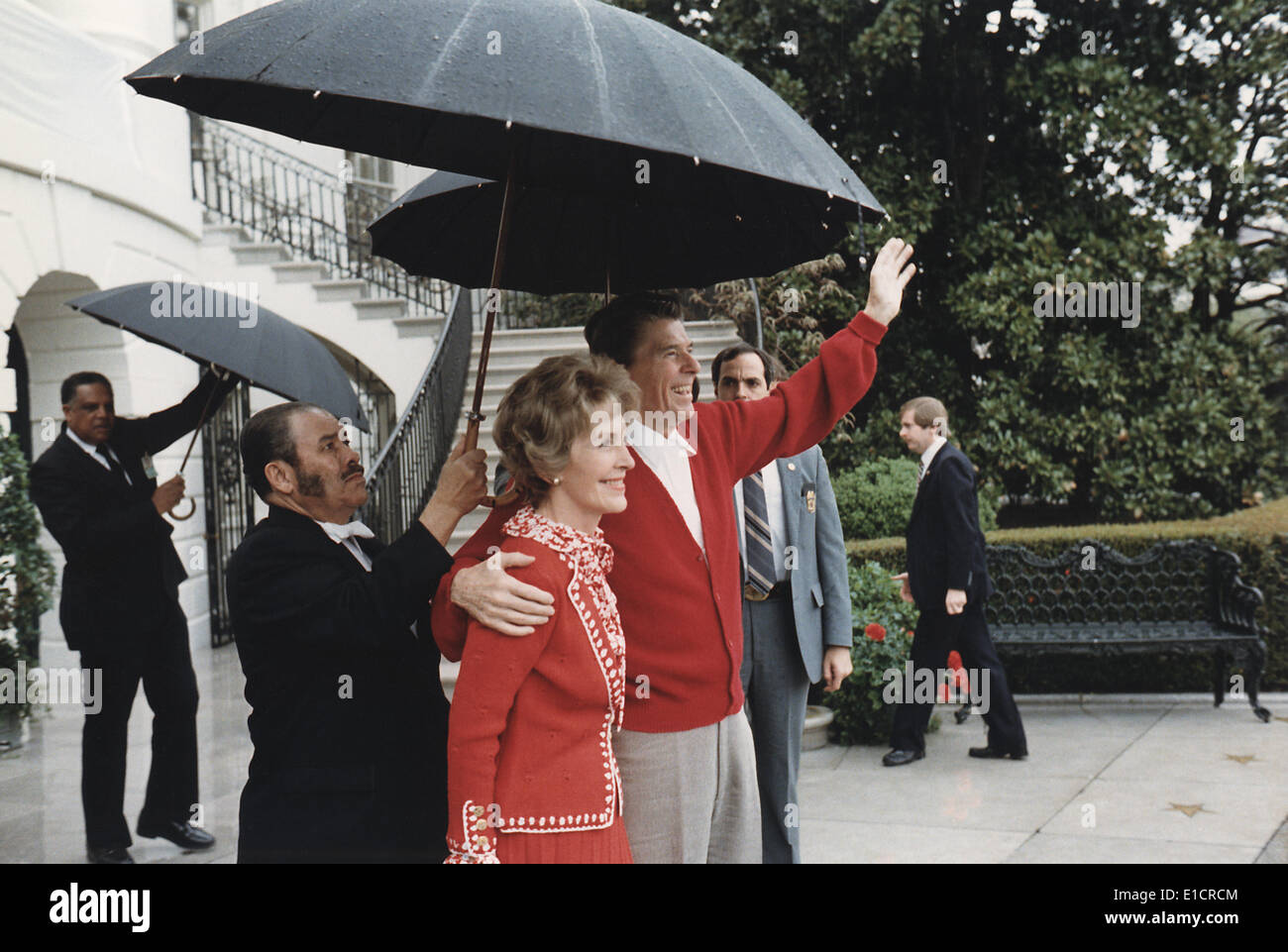President Ronald Reagan and First Lady Nancy Reagan wave from the White ...