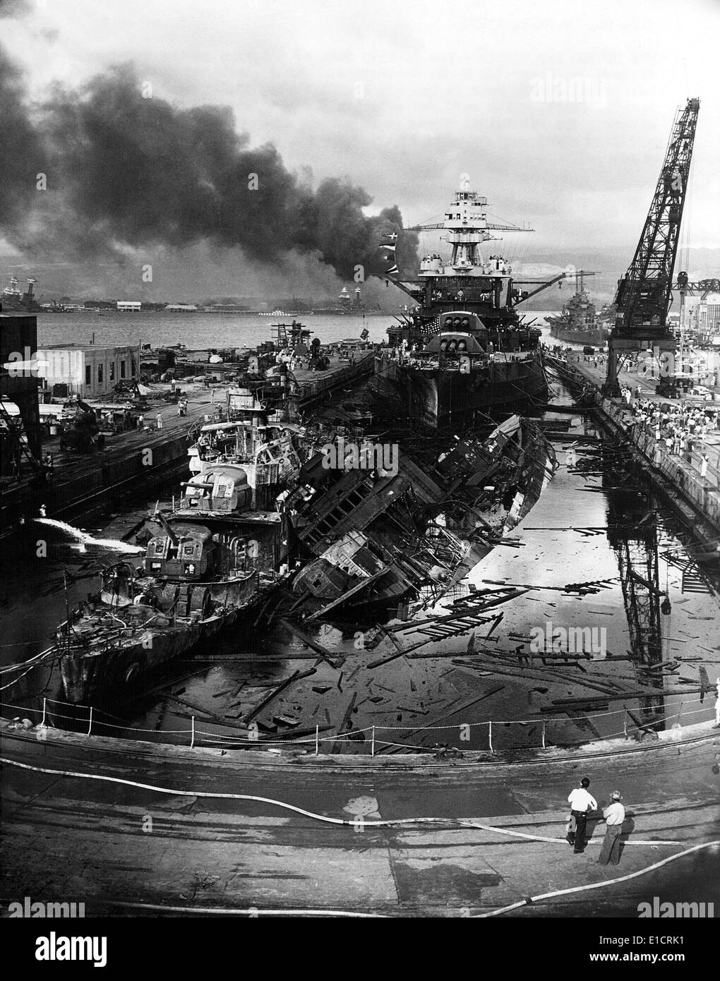 The wreckage of the destroyers USS Downes (left) and USS Cassin at ...