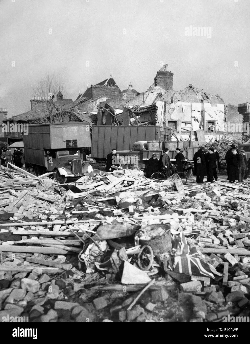 World War 2, Battle of Britain. A Union Jack flag lies among the rubble ...