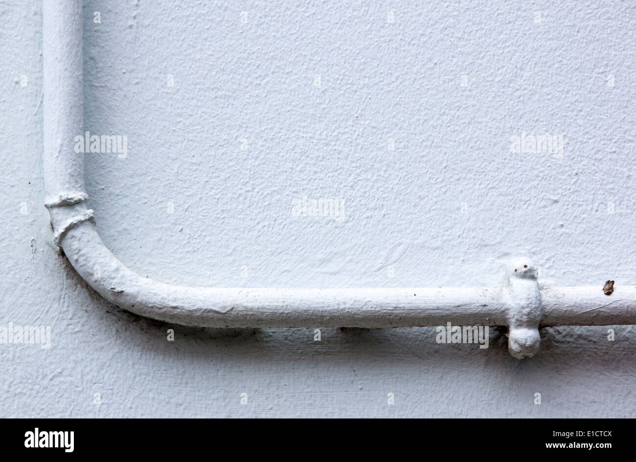 Wall mounted pipes hi-res stock photography and images - Alamy