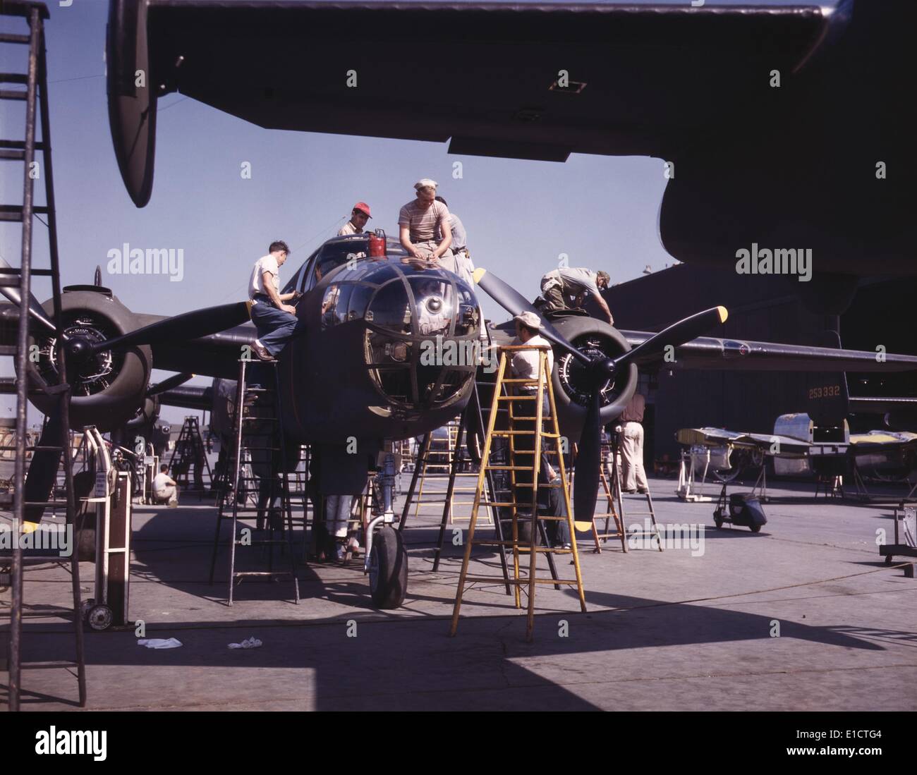 Outdoor assembly line at North American Aviation puts the finishing ...
