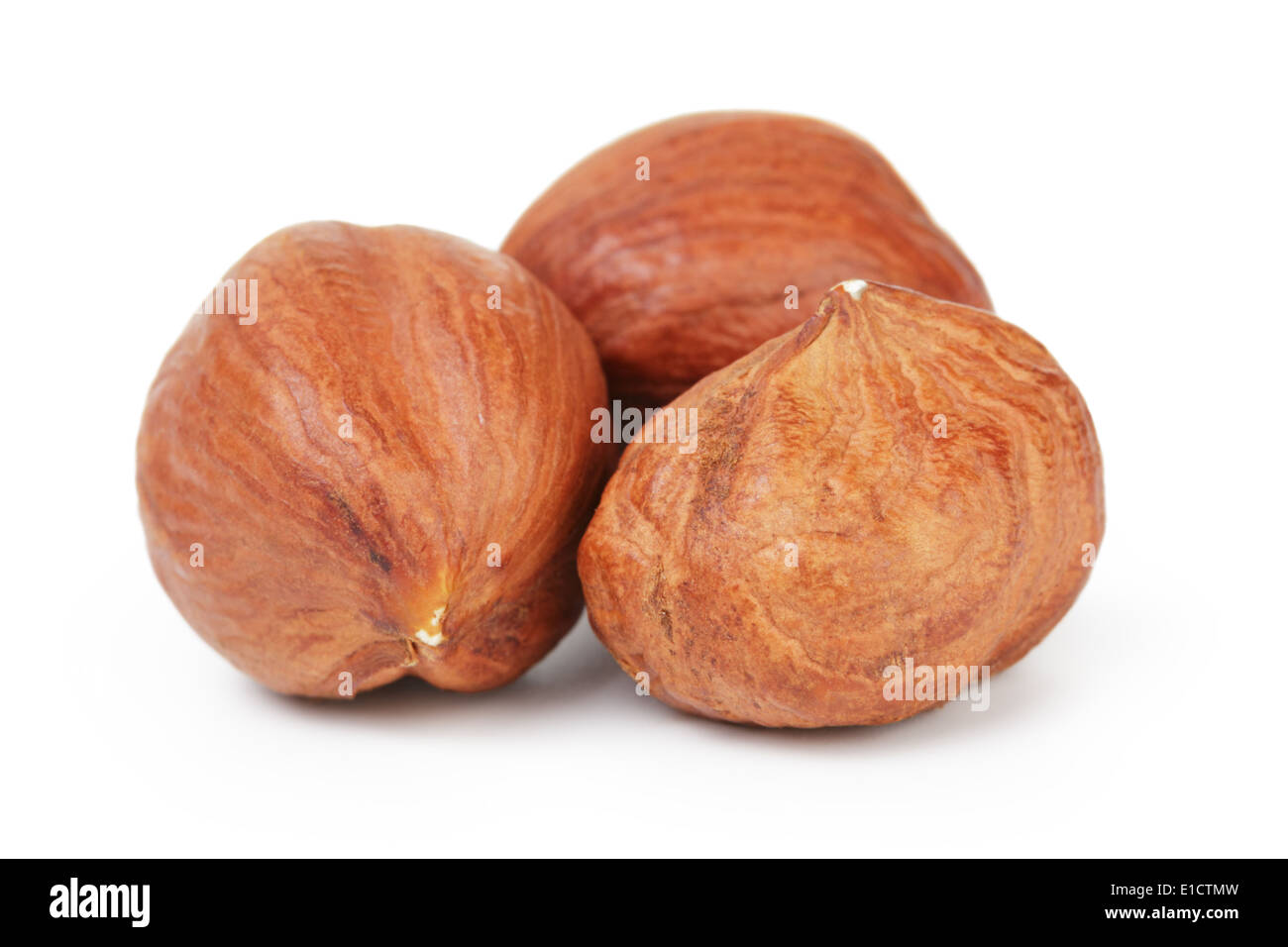 three hazelnut kernels, isolated on white background Stock Photo - Alamy