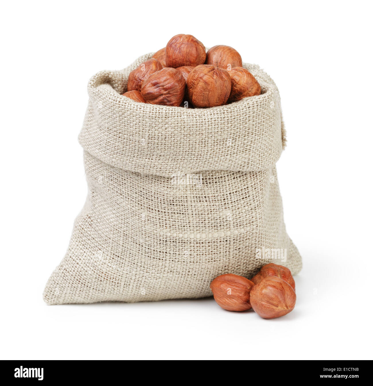 organic hazelnuts in sack pouch, isolated on white Stock Photo - Alamy